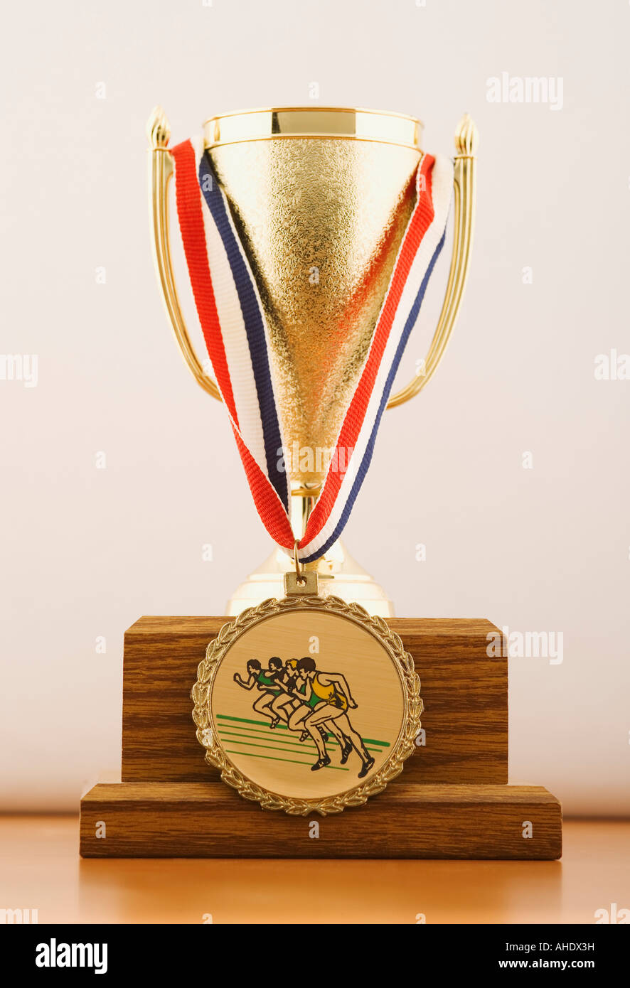 Trophy with medal Stock Photo - Alamy