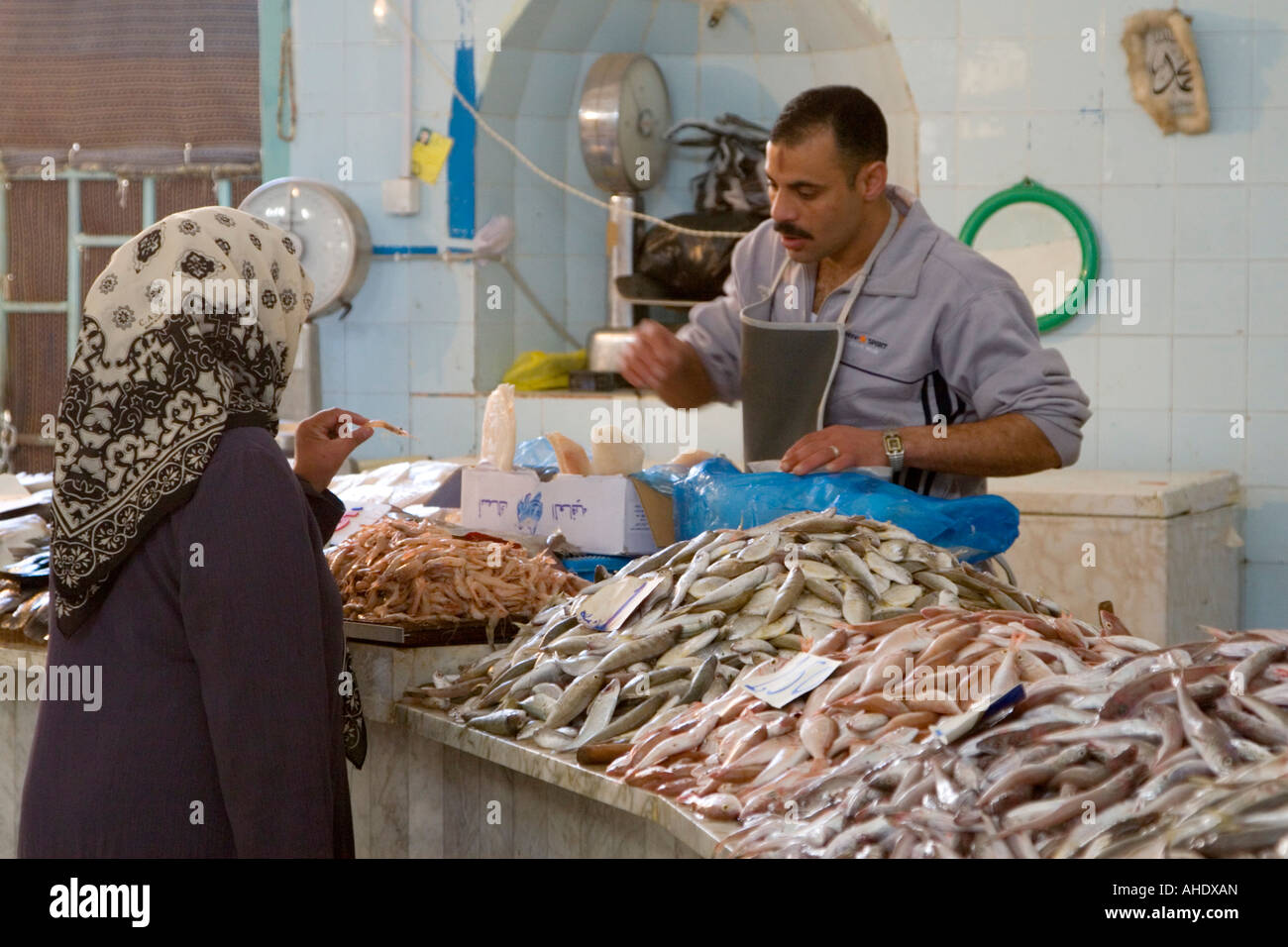 Tripoli, Libya. Woman Discussing Shrimp Before a Purchase, Fish Market ...