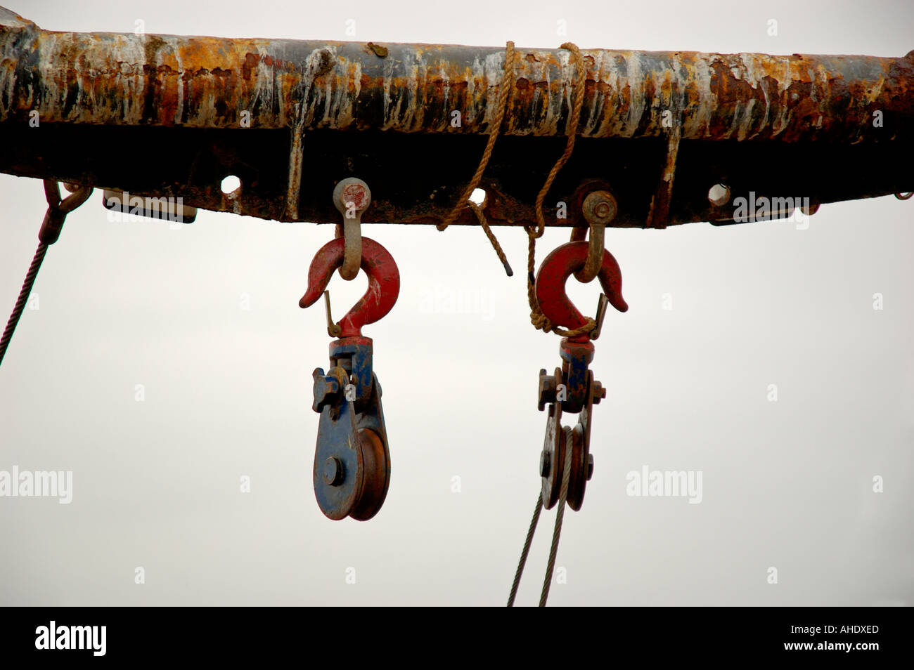 Old and rusty heavy duty hooks on ship Stock Photo - Alamy