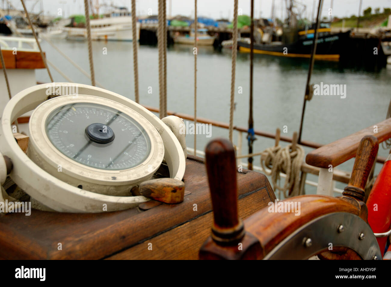 Navigation instruments and rudder of tallship Stock Photo - Alamy