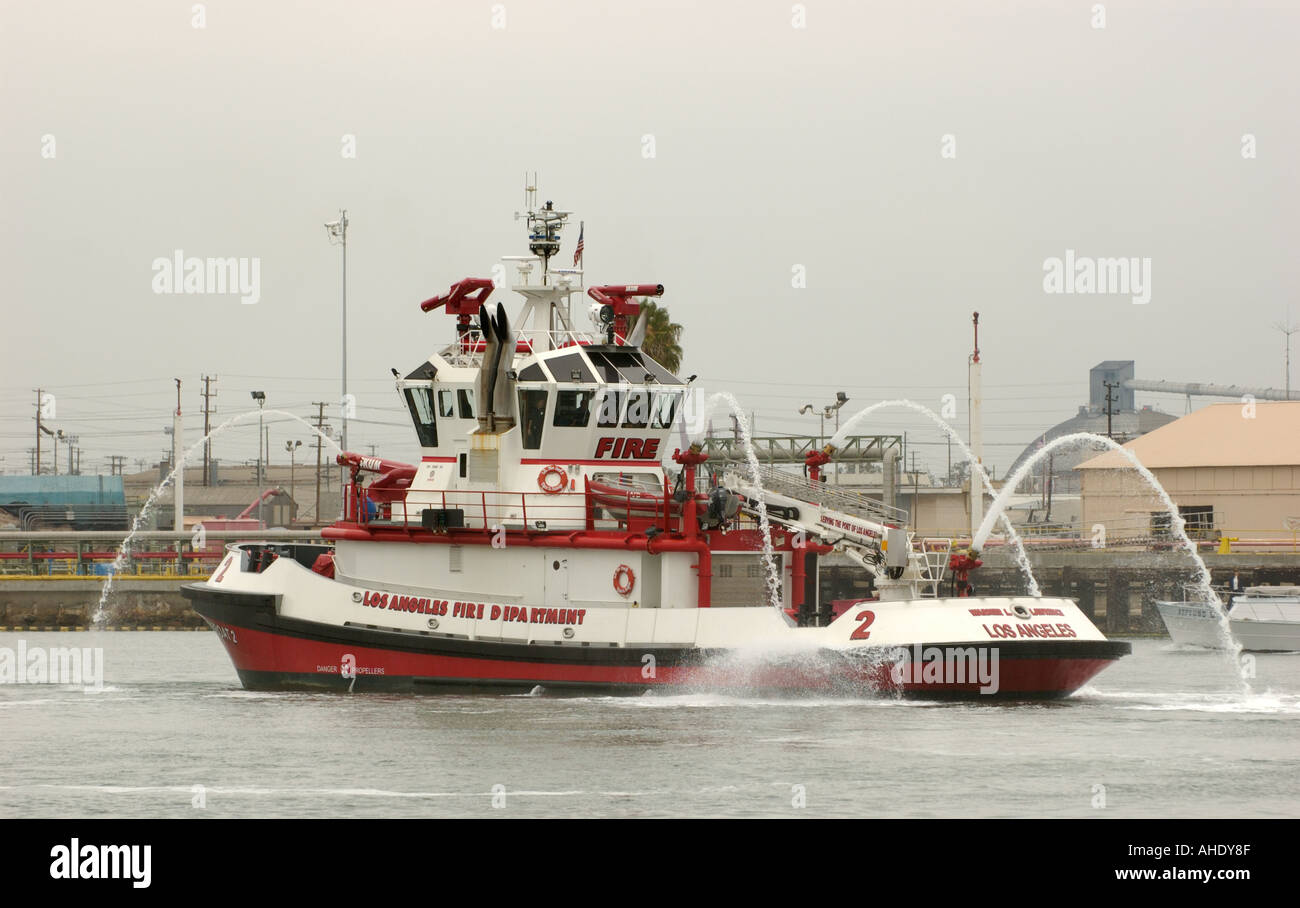 Fire Fighting Boat sprays jets of water Stock Photo - Alamy
