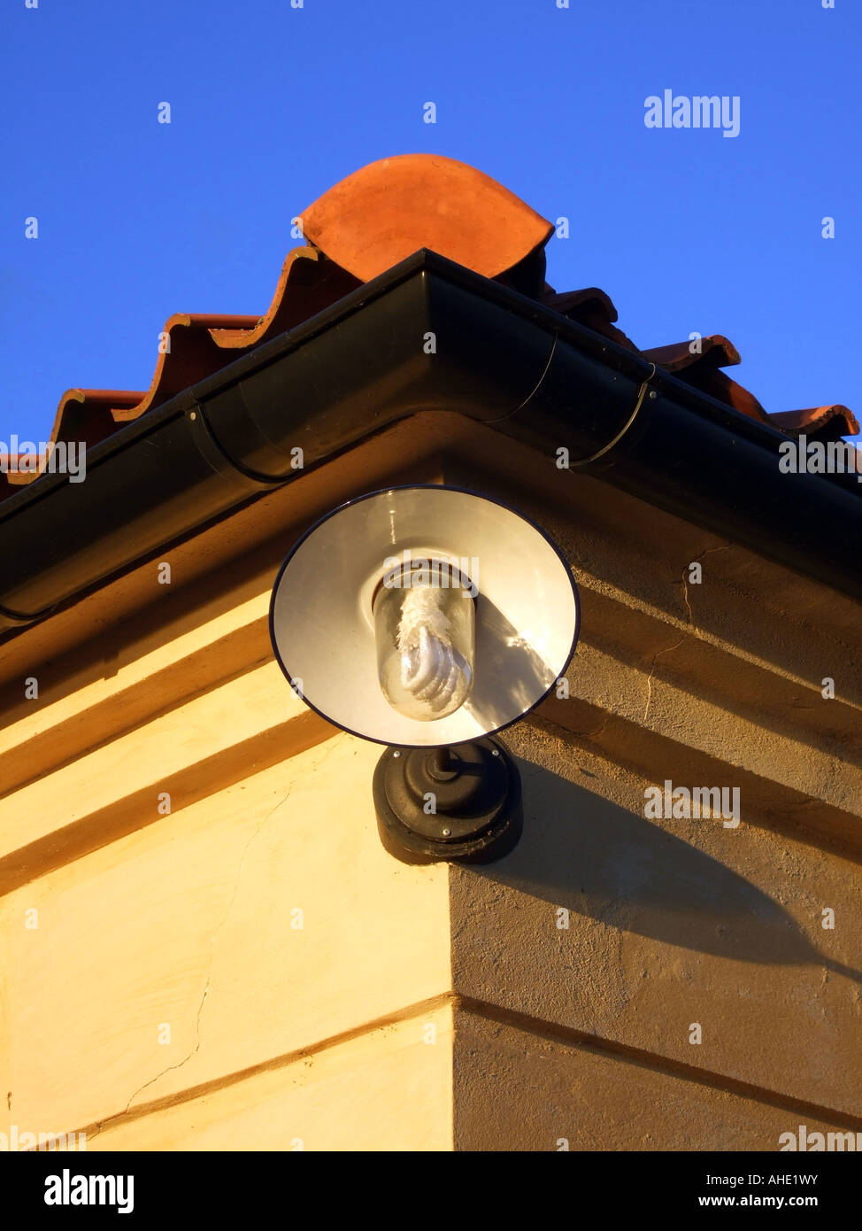 Street lamp on building Stock Photo - Alamy