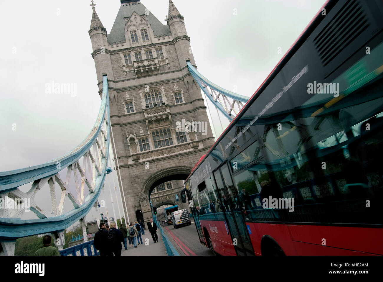 Red Bus Crosses Tower Bridge London Stock Photo - Alamy