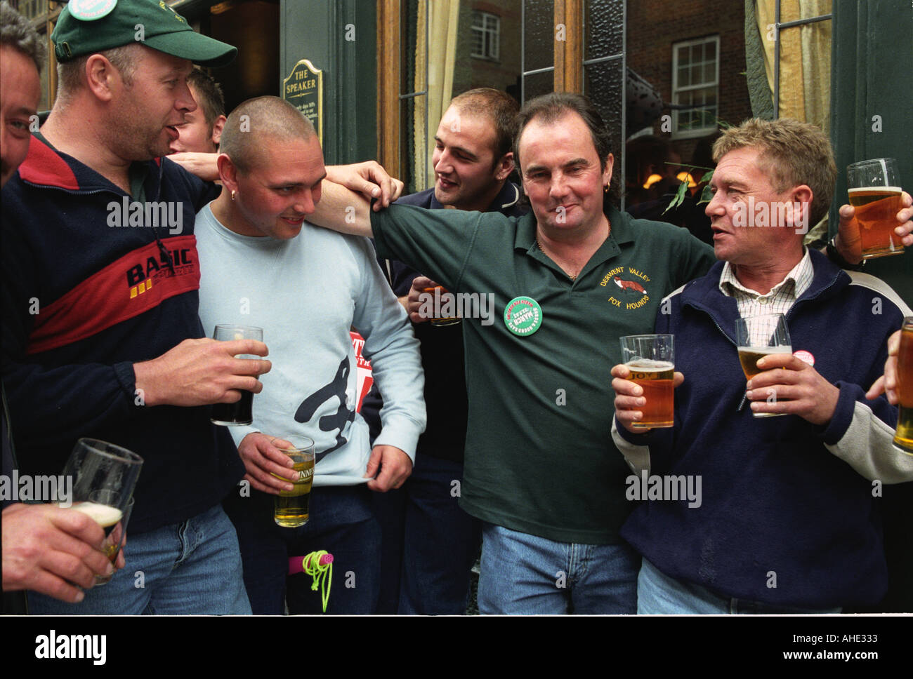 Men out together drinking at the local pub in London Stock Photo - Alamy