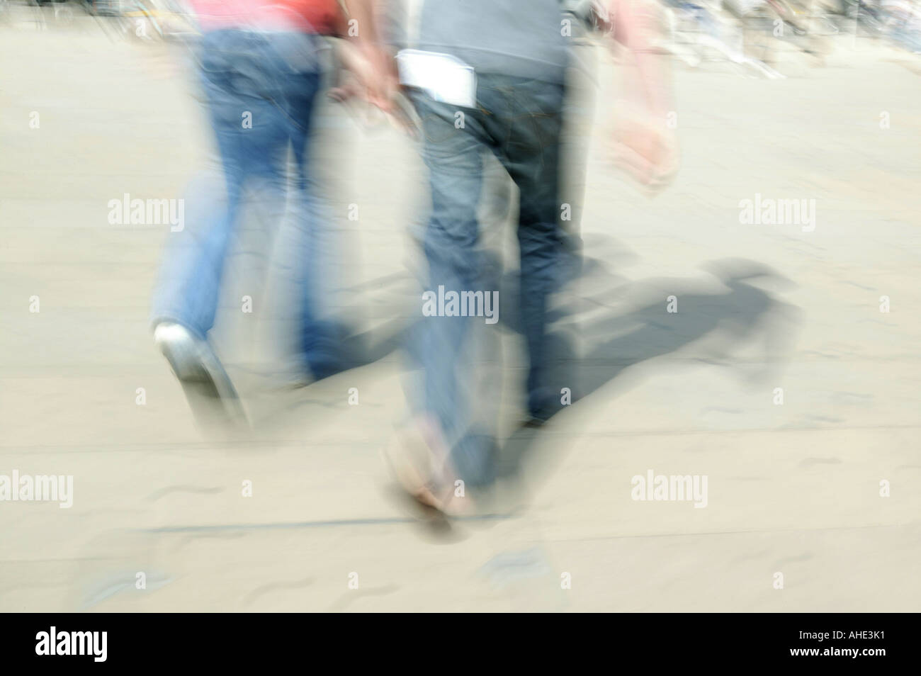 two people rushing in public environment Stock Photo - Alamy