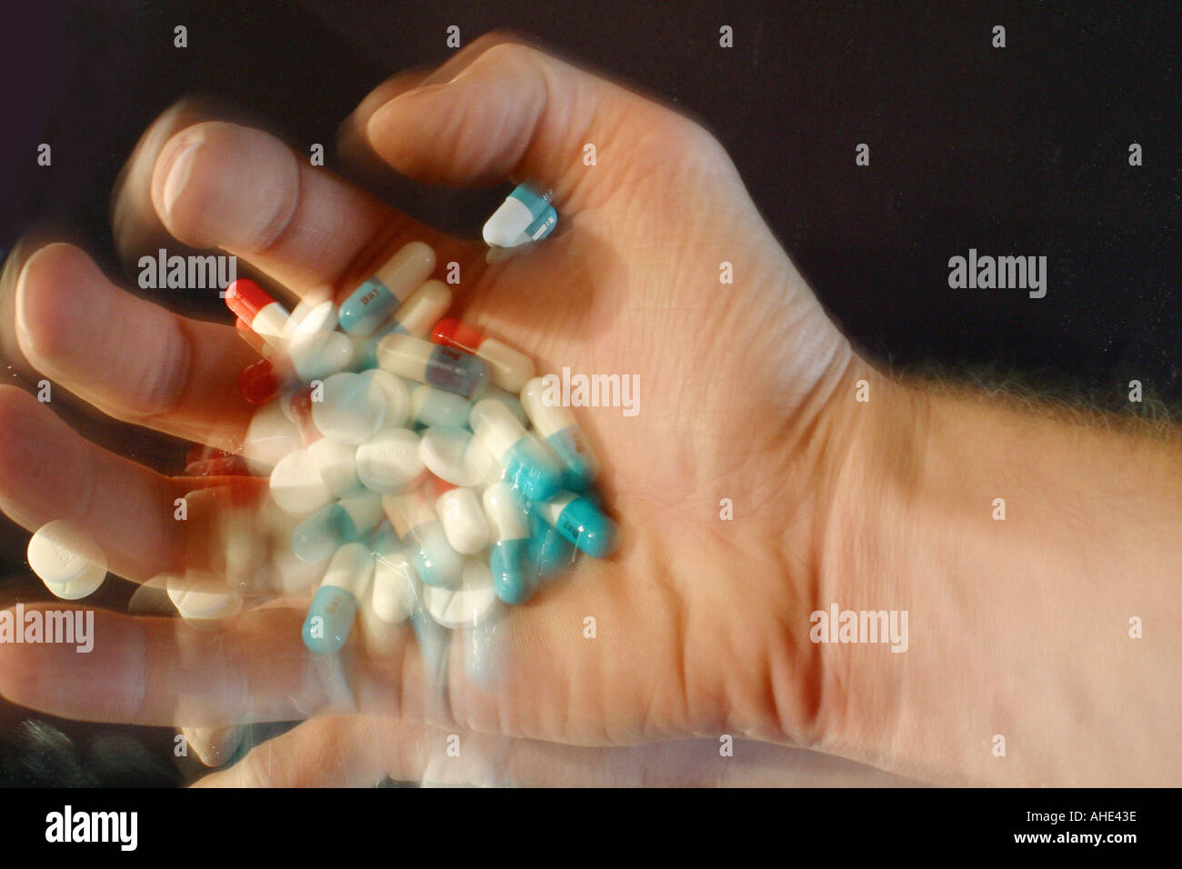 Handful of tablets hi-res stock photography and images - Alamy
