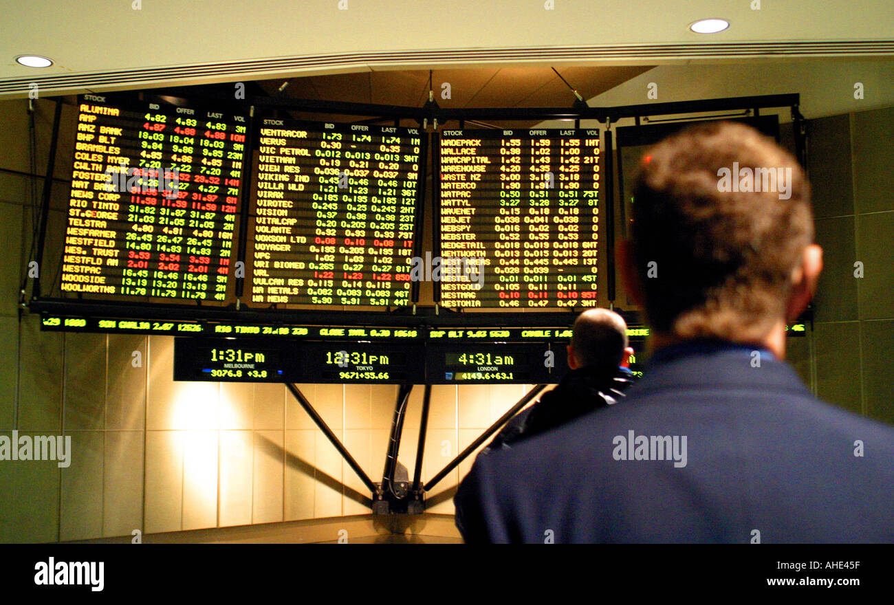 Stock Market board and trader Stock Photo - Alamy