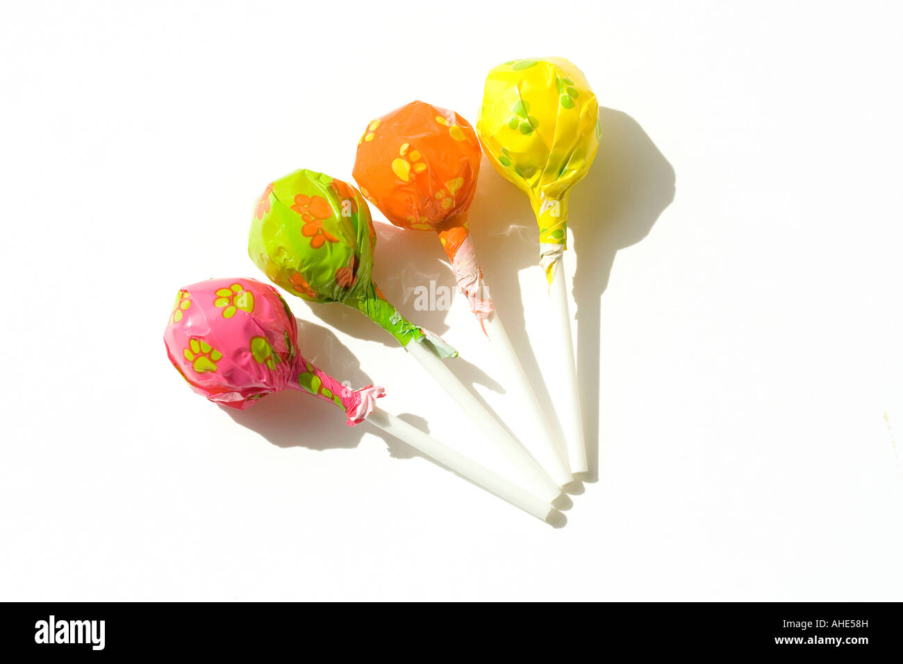 Four colored lollipop Stock Photo - Alamy