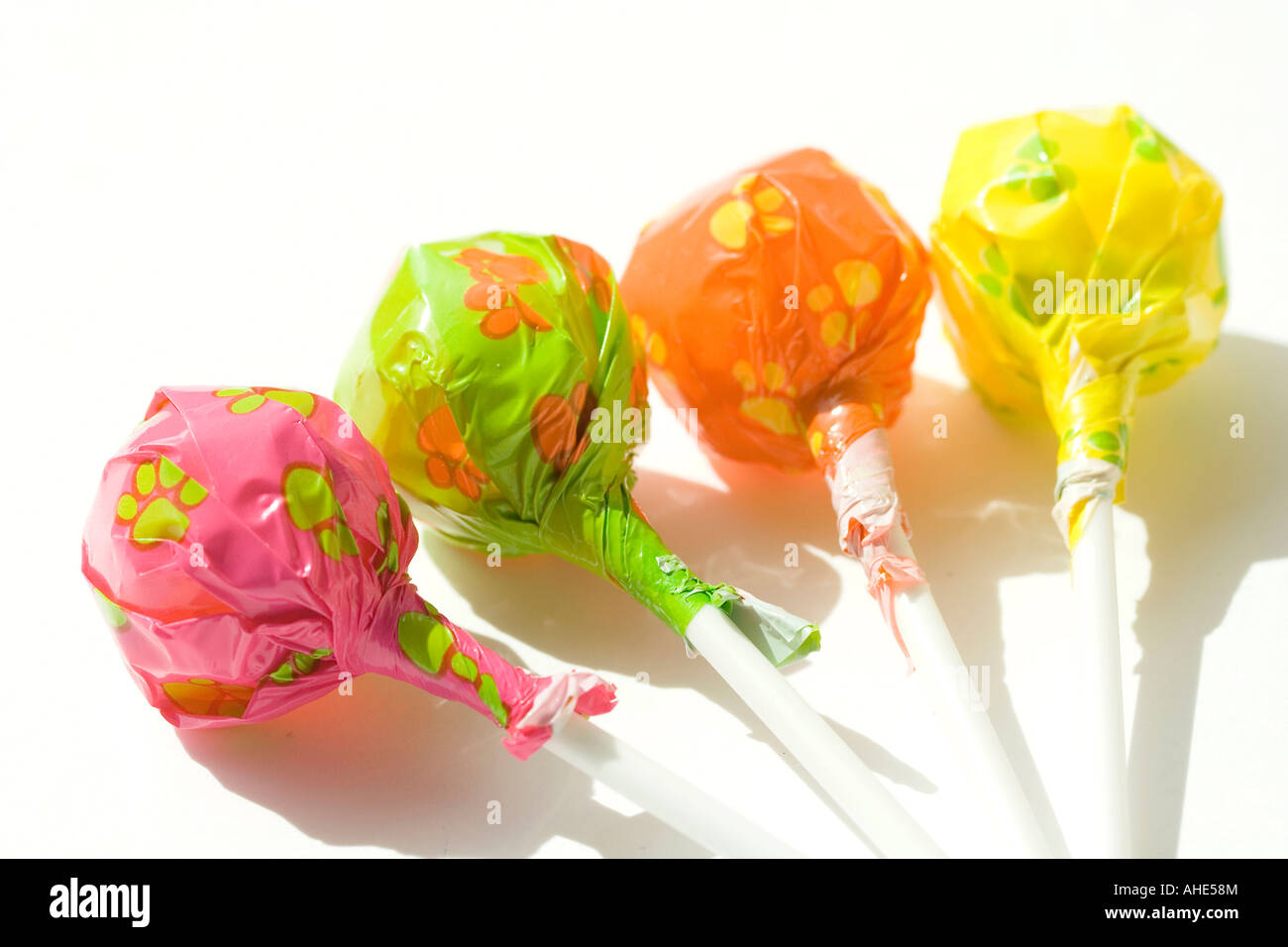 Four colored lollipop Stock Photo - Alamy
