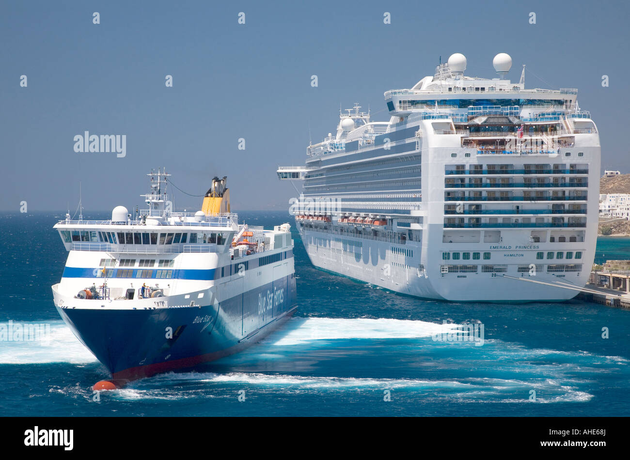 A domestic ferry manoeuvres upon arrival at the new port of Mykonos ...