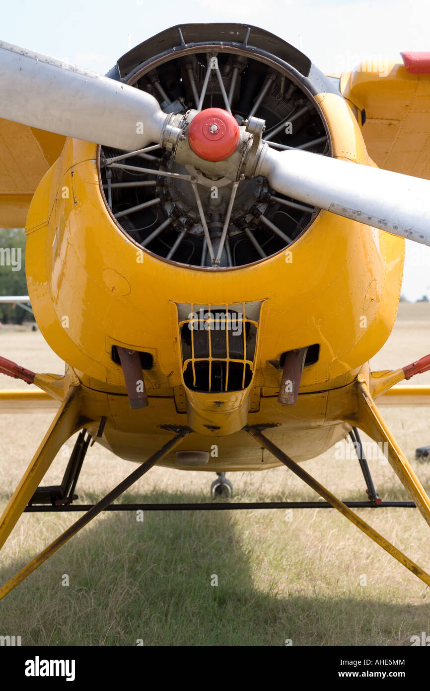 old yellow airplane on the ground Stock Photo - Alamy