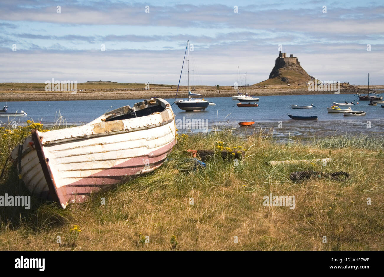 Lindisfarne castle on holy island boats hi-res stock photography and ...