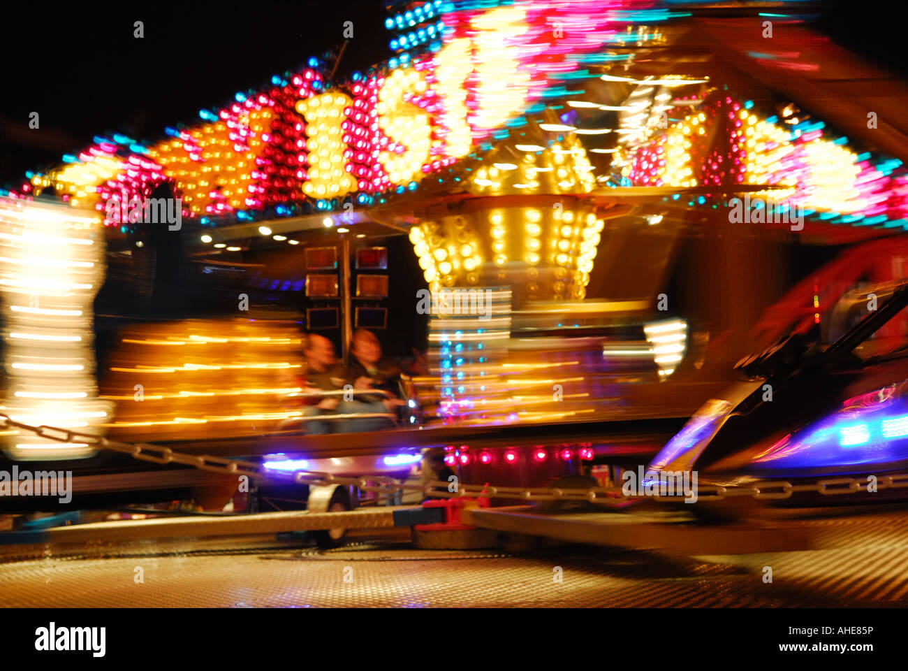Twister ride funfair ride Stock Photo - Alamy