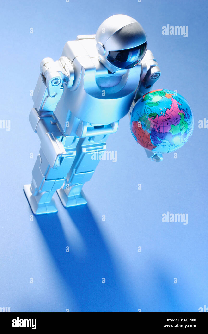 Robot Holding Globe Stock Photo - Alamy