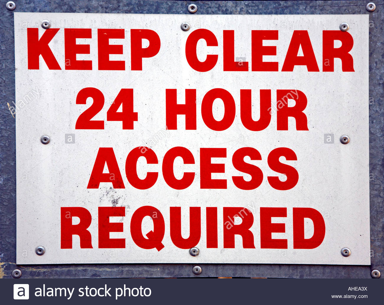 Keep clear signpost Stock Photo - Alamy