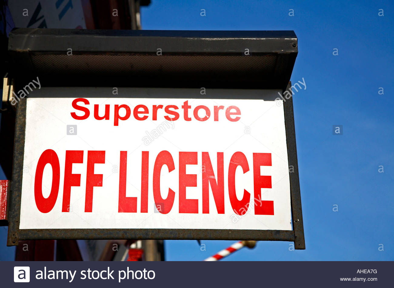 Off licence signpost Stock Photo - Alamy