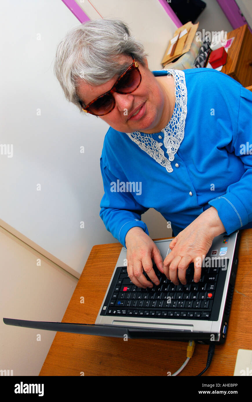 Blind woman dark glasses hi-res stock photography and images - Alamy