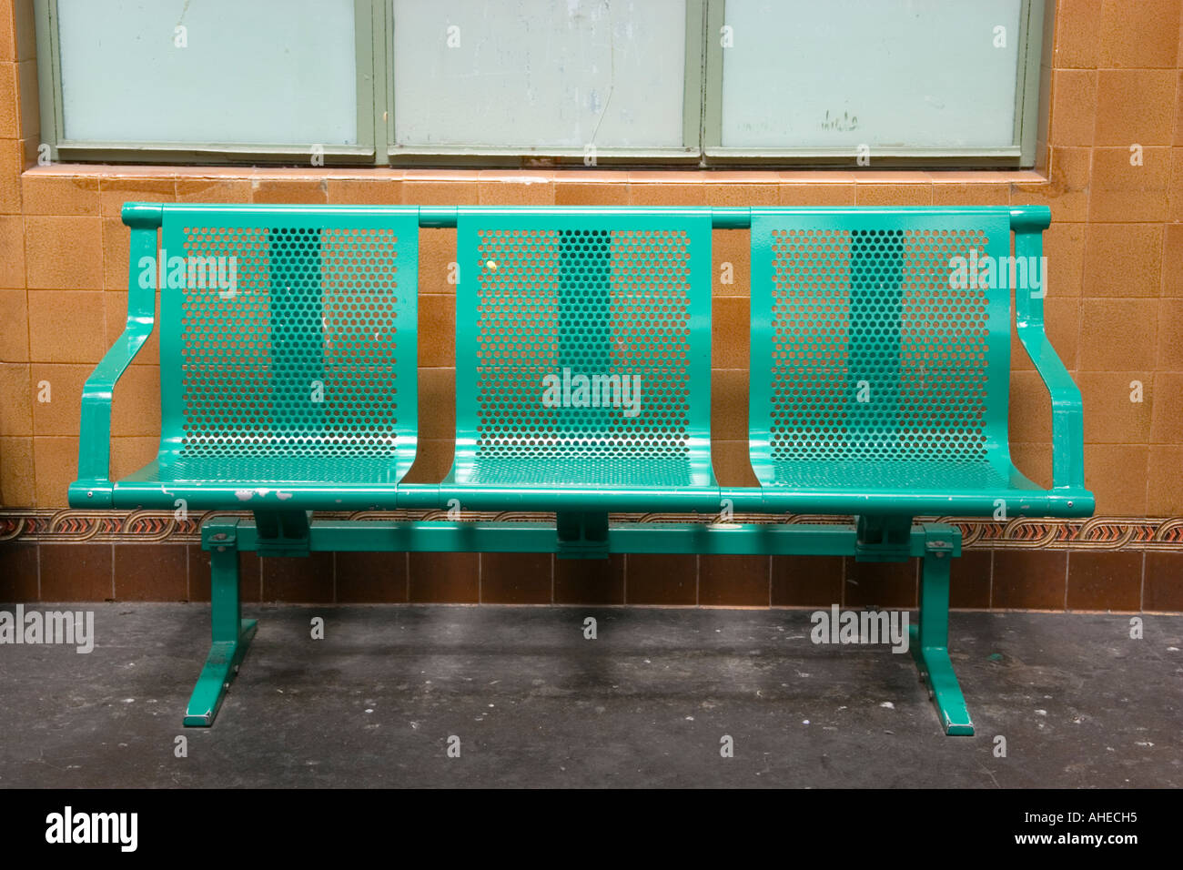 green metal bench Stock Photo - Alamy