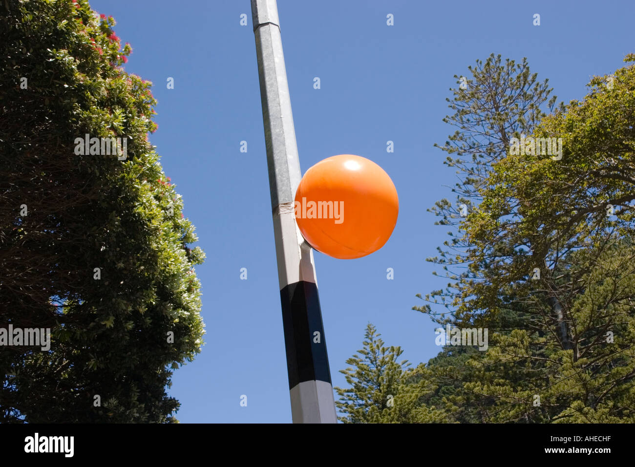 orange globe light on pole Stock Photo - Alamy