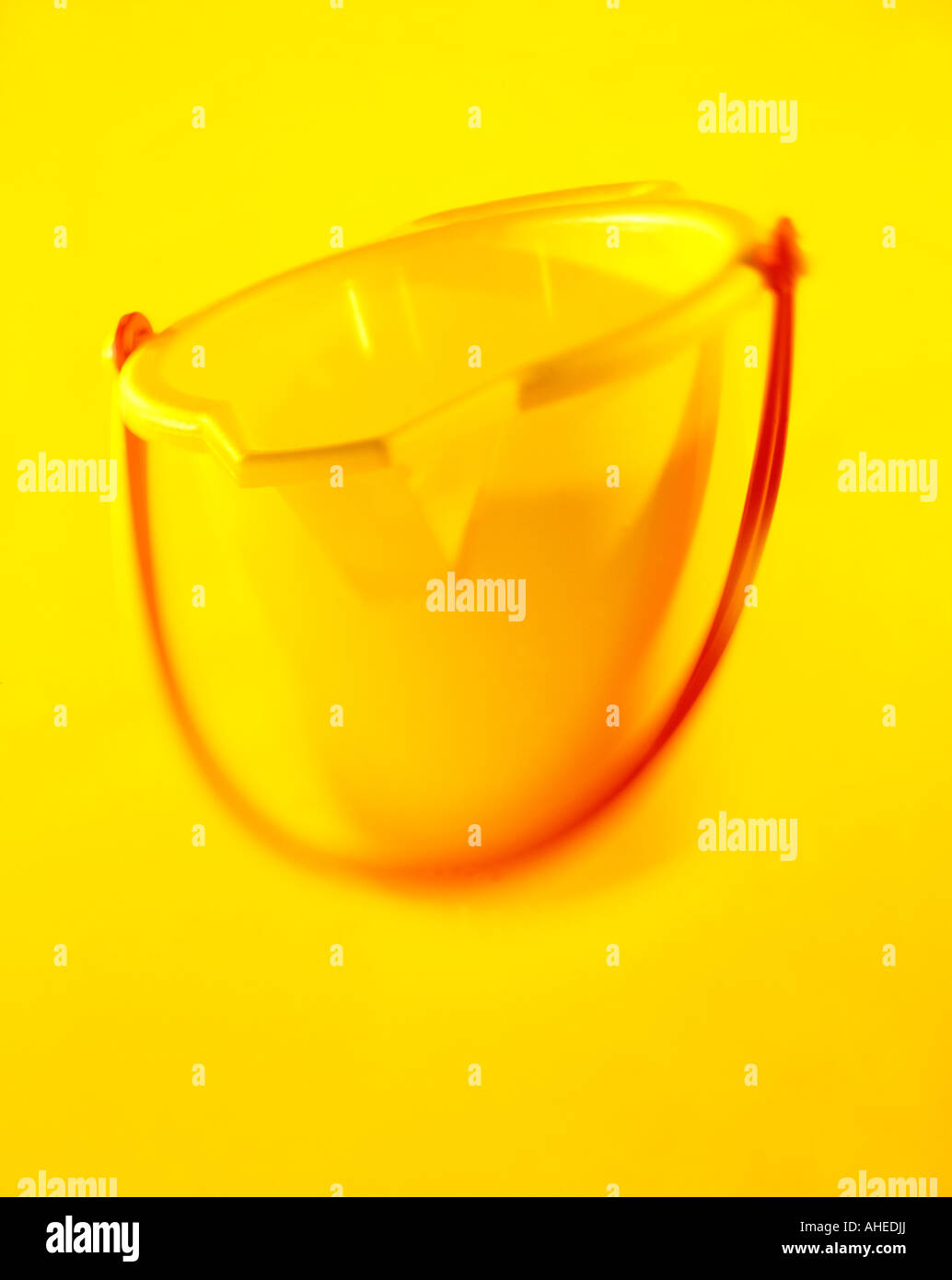 Yellow plastic bucket Stock Photo - Alamy