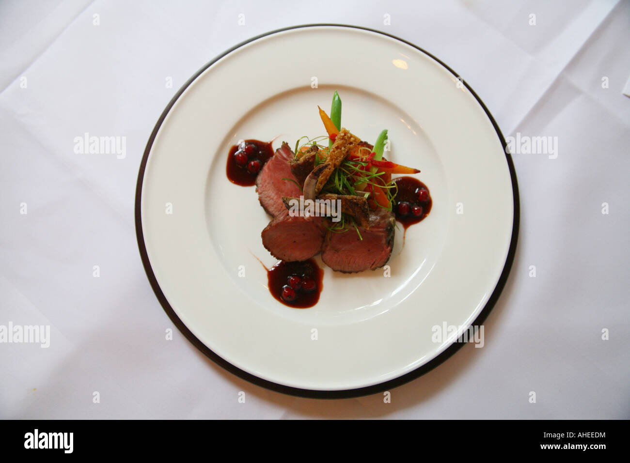 Fine dining; fillet of lamb at a food fair Stock Photo - Alamy