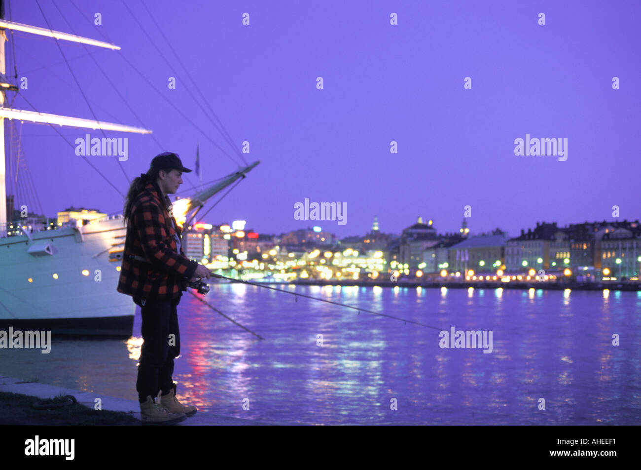 SWEDEN STOCKHOLM THE OLD TOWN FISHING IN STROMMEN Stock Photo - Alamy
