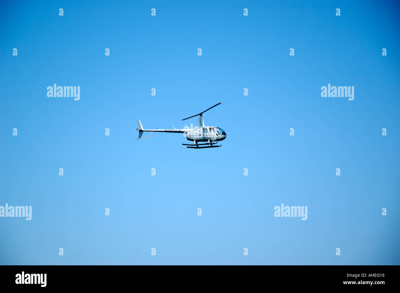 Robinson R44 Raven II in flight Stock Photo - Alamy