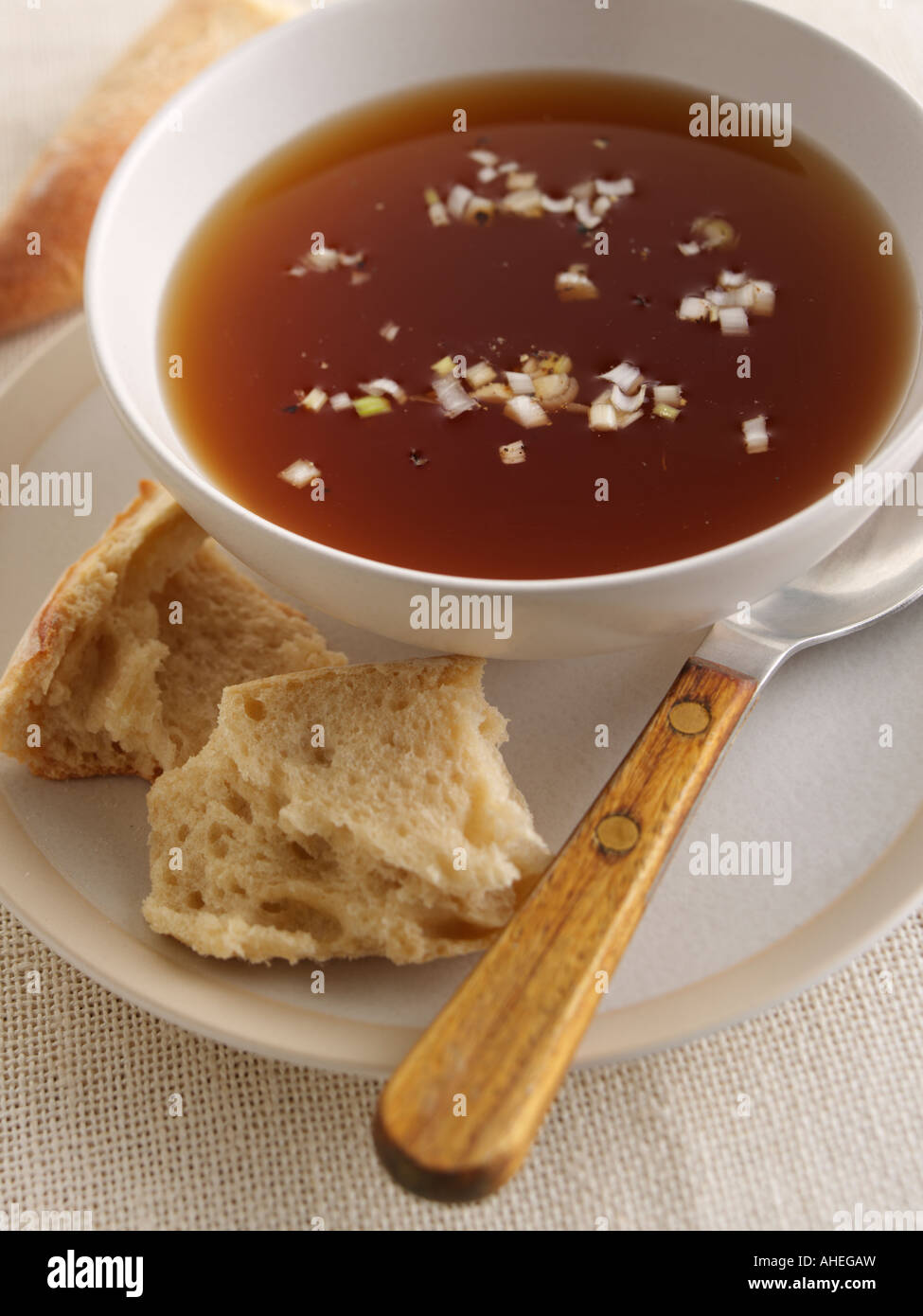 A bowl of consommé editorial food Stock Photo - Alamy
