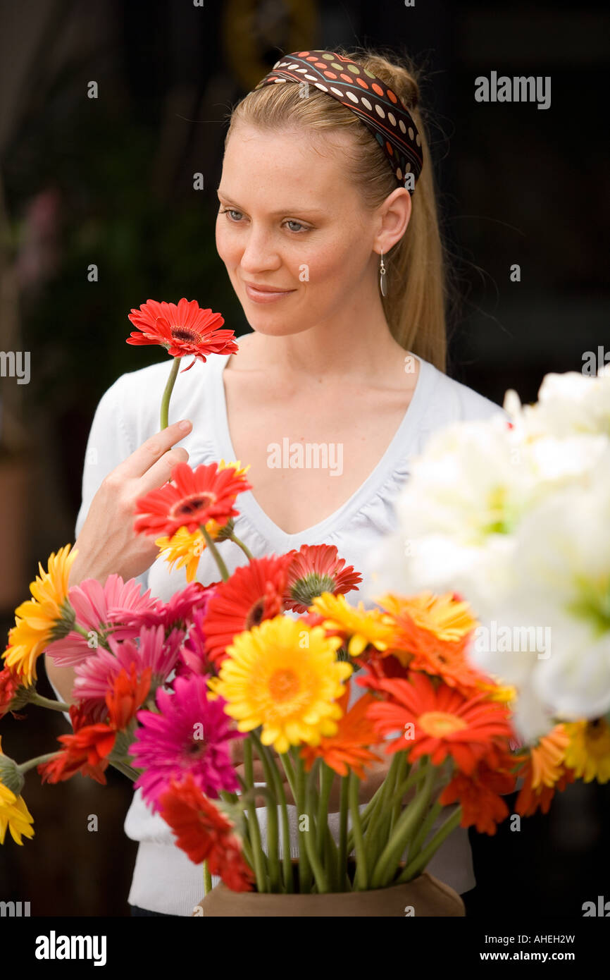 Woman selecting flower bouquet hi-res stock photography and images - Alamy