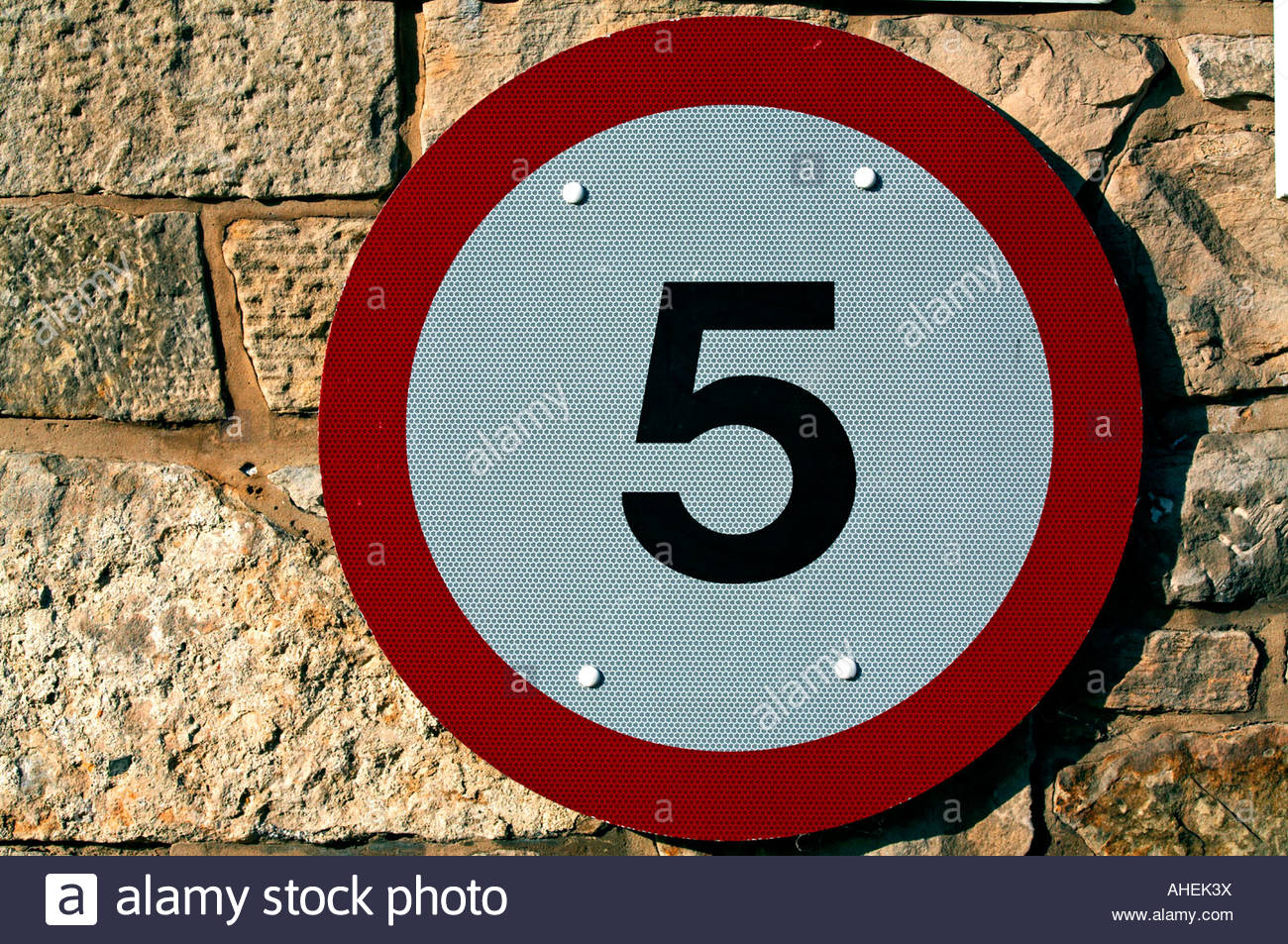 5 MPH Speed limit signpost Stock Photo - Alamy