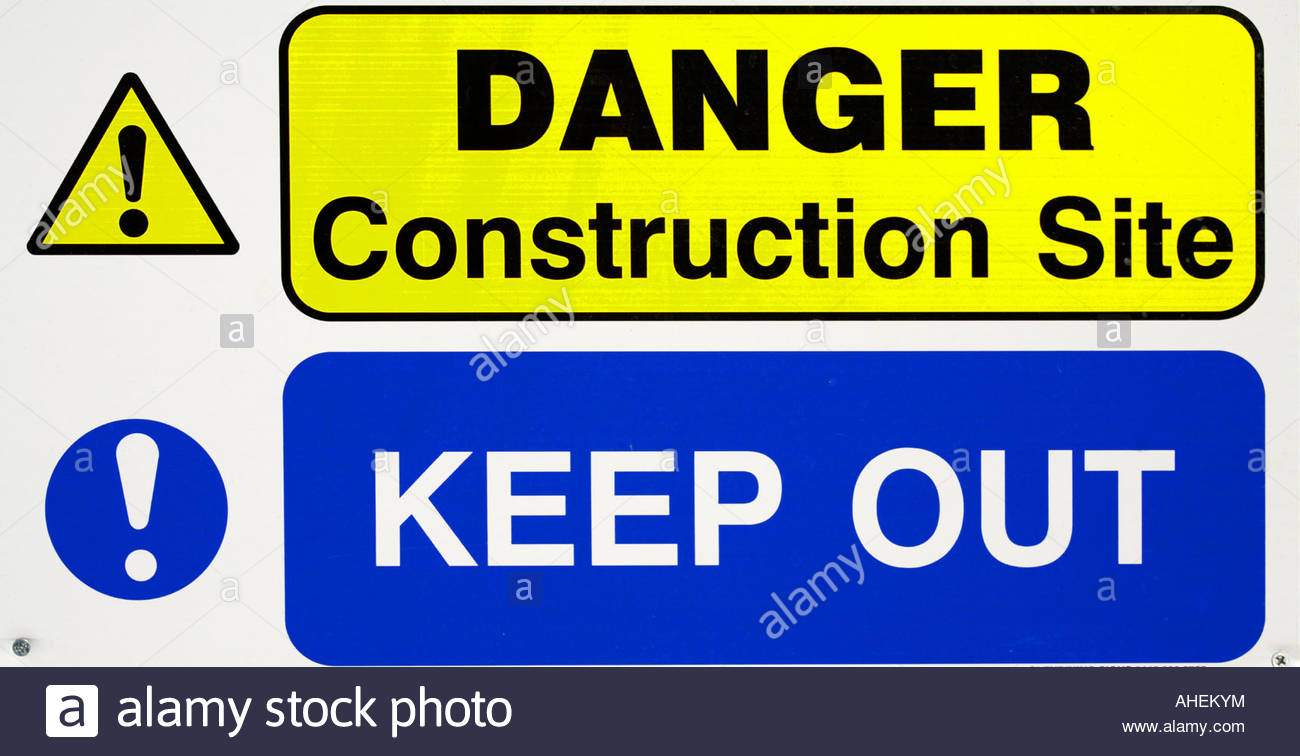 Danger keep out signpost Stock Photo - Alamy