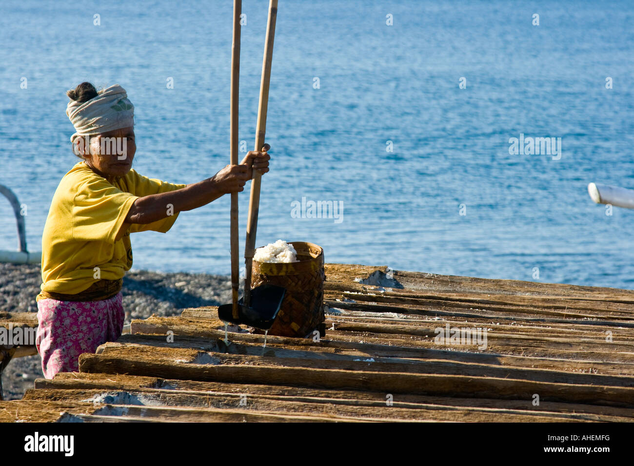 Woman Collecting Artisanal Salt duringProduction Amed Bali Indonesia ...