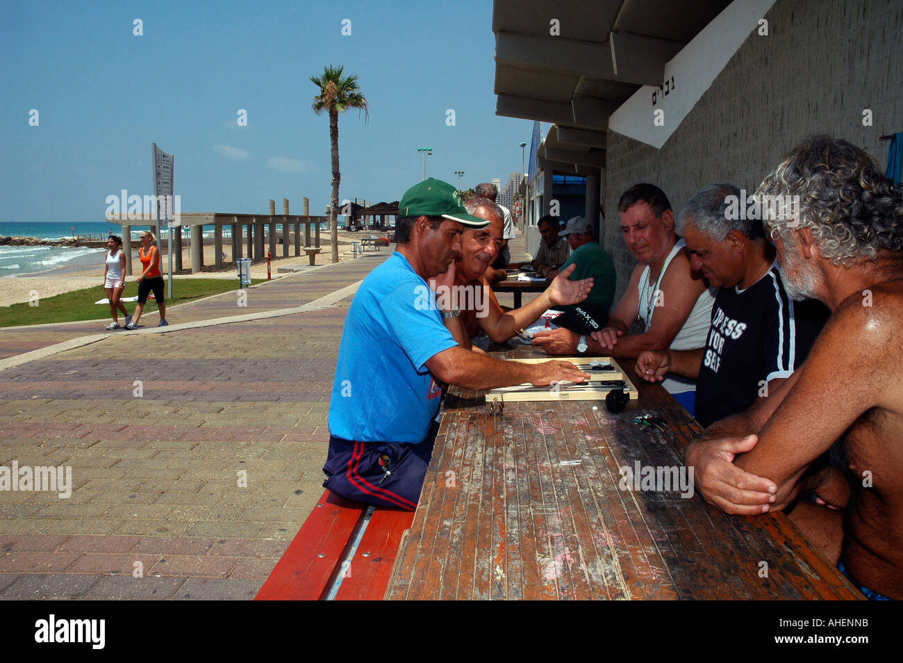 Men playing domino at the seacoast of Haifa city in Israel Stock Photo ...