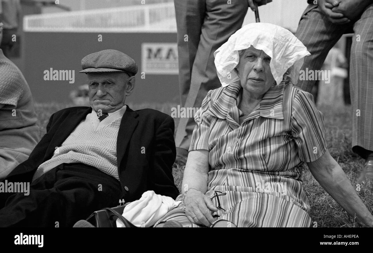 Old couple out in the sun looking rather miserable and unhappy Stock ...