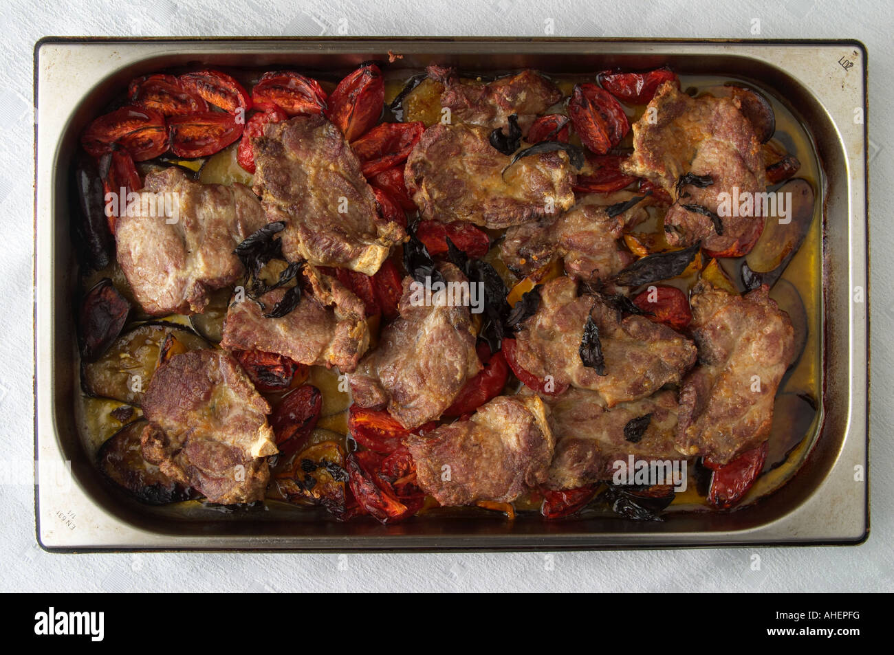 Roast meat on big plate Stock Photo - Alamy