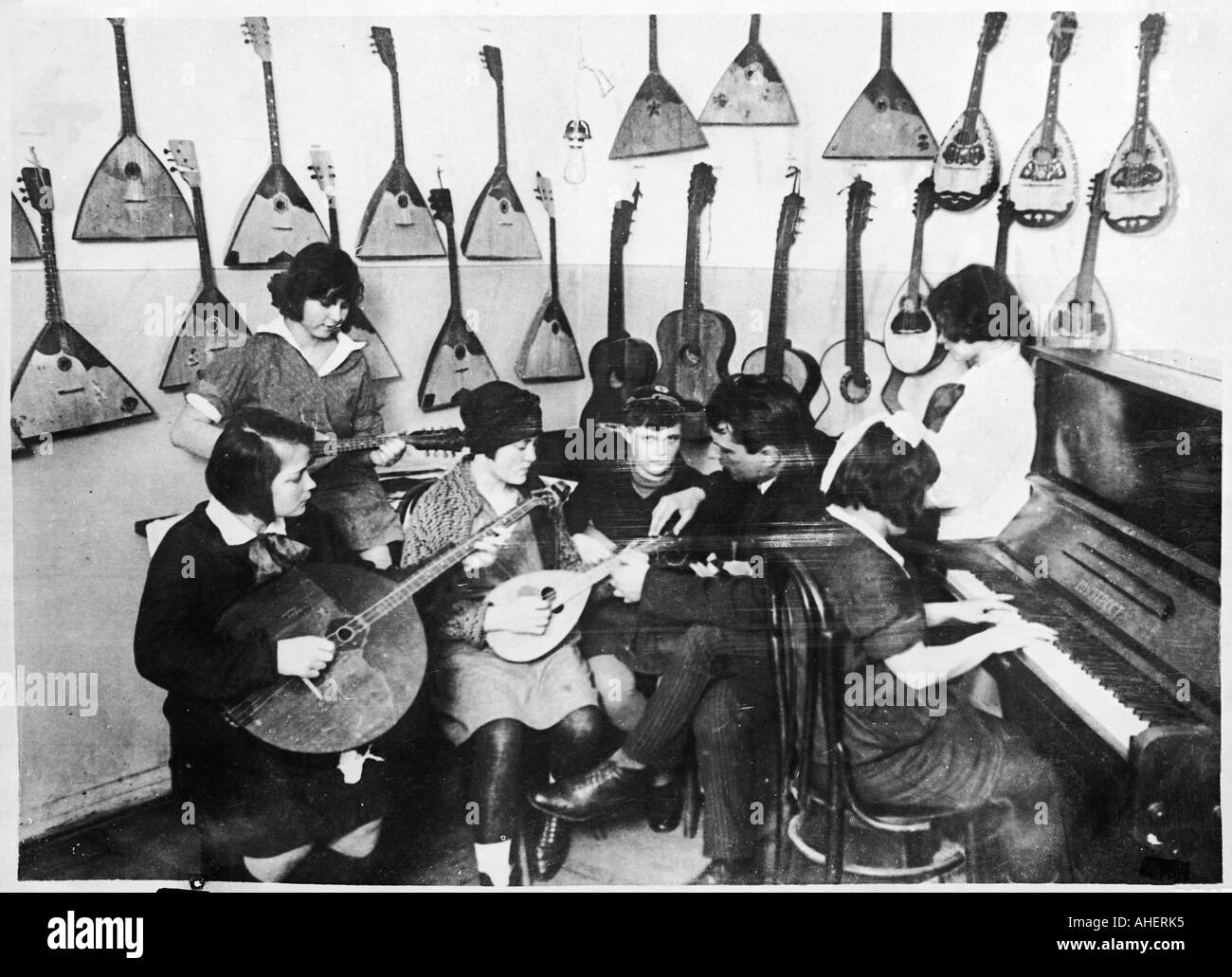 Learning balalaika hi-res stock photography and images - Alamy