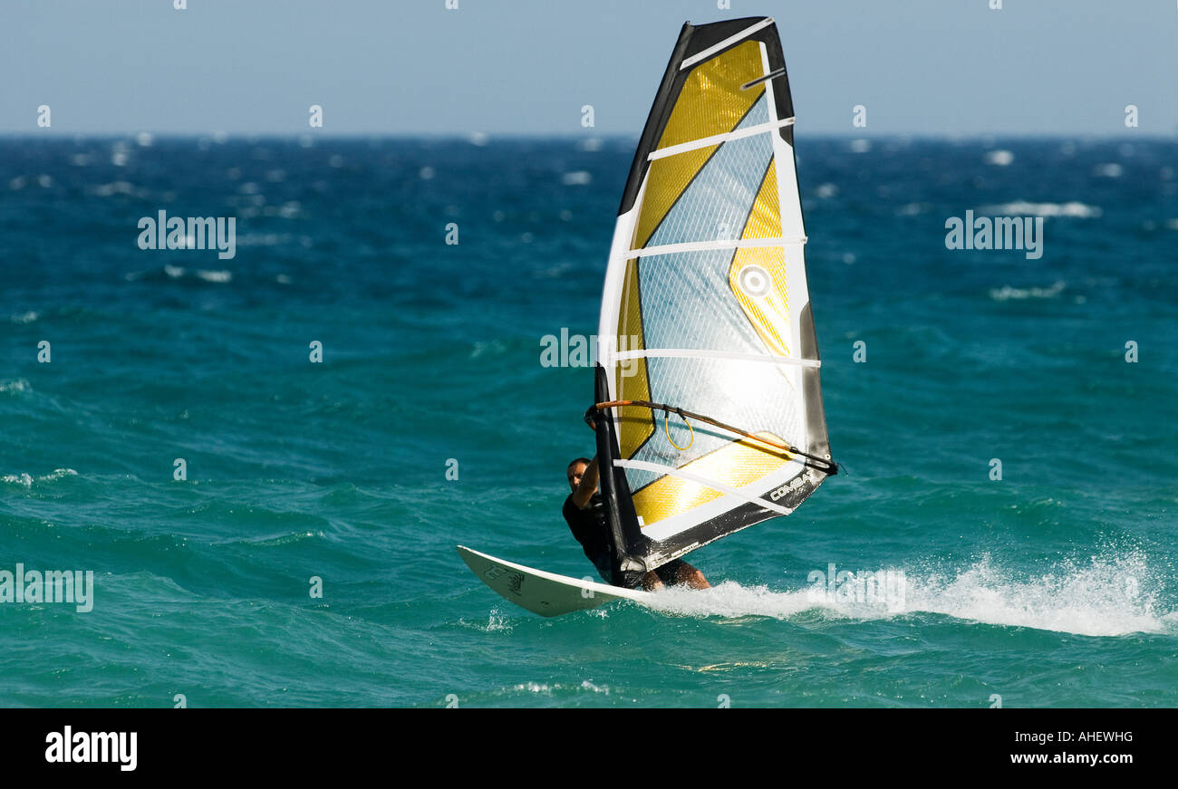 windsurfer rides the waves in the mediterranean sea Stock Photo - Alamy