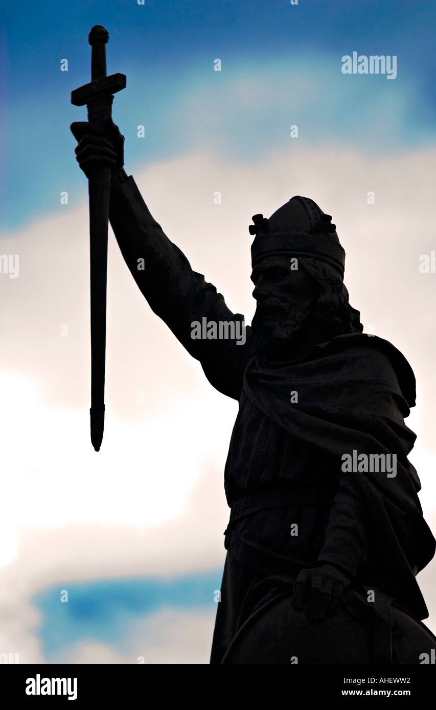 Silhouetted statue of King Alfred the Great Anglo Saxon King of Wessex ...