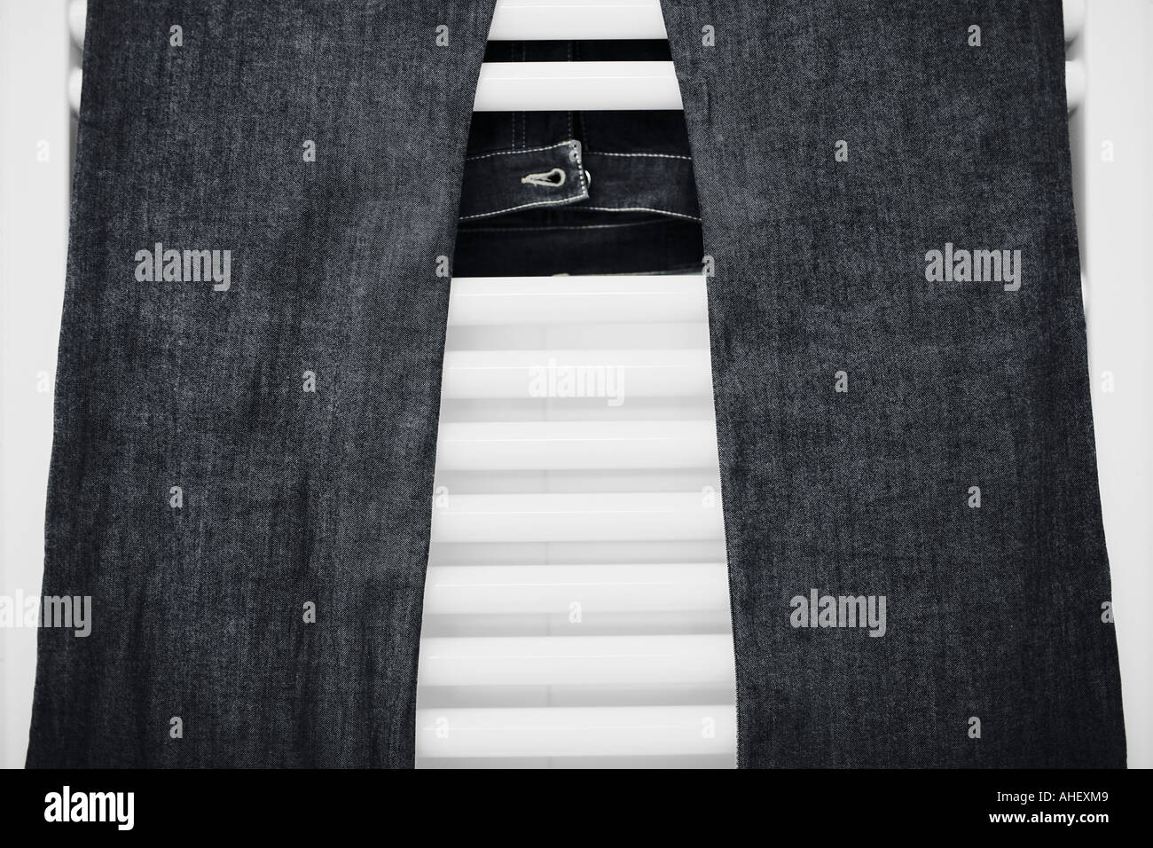 Denim Drying In Hotel Bathroom Stock Photo - Alamy