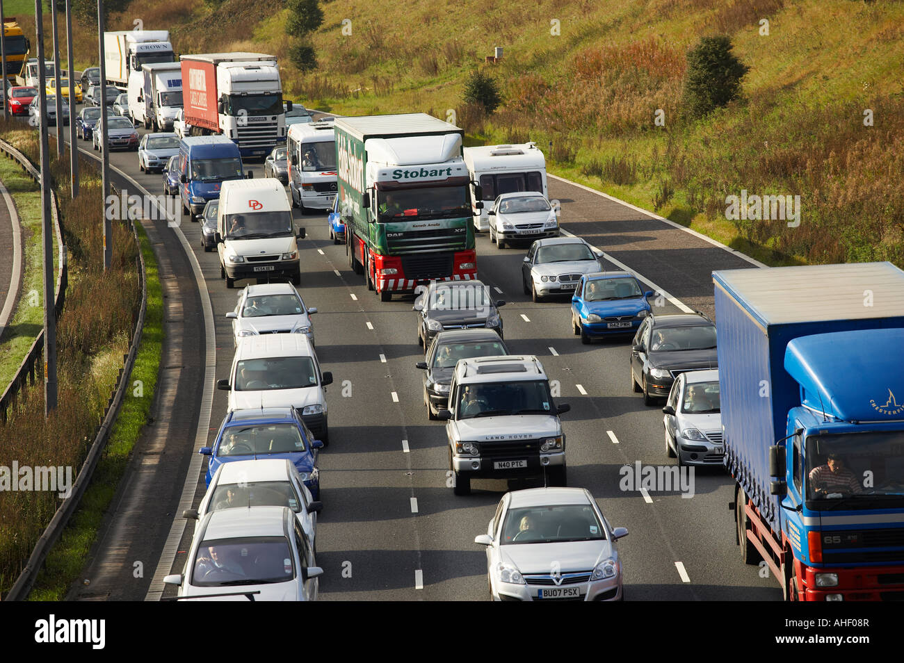HEAVY RUSH HOUR TRAFFIC QUEUE ON MOTORWAY Stock Photo - Alamy