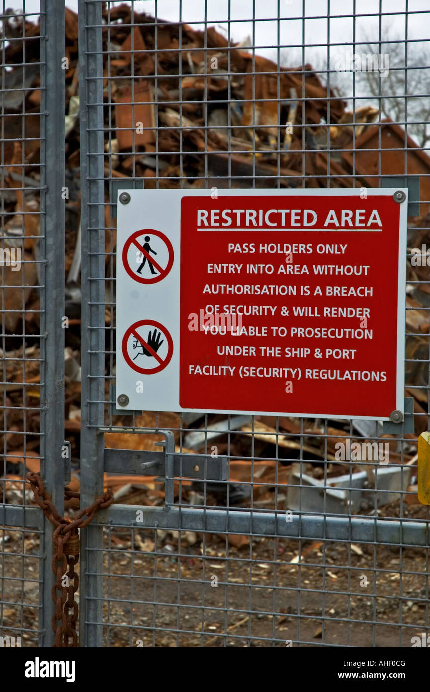 a no entry sign on the gates of a scrap yard in cornwall,england Stock ...
