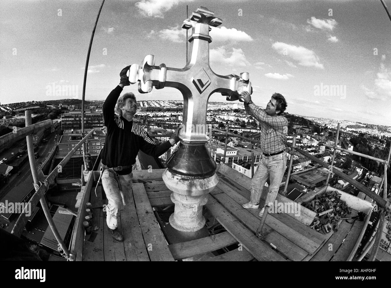 Refitting the refurbished cross on top of St Bartholomews Church ...