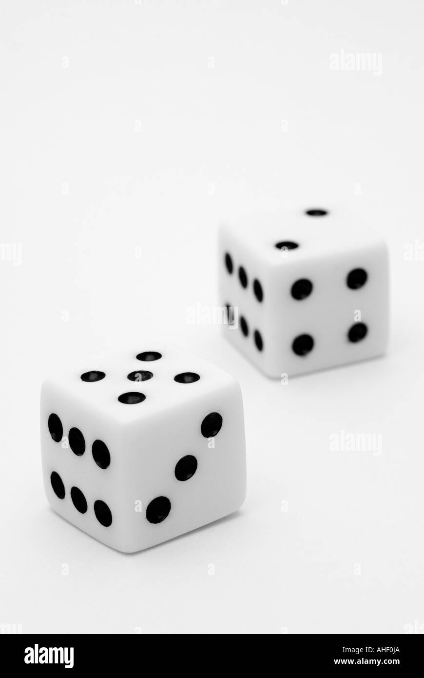 Two Dice Against a White Background Stock Photo - Alamy
