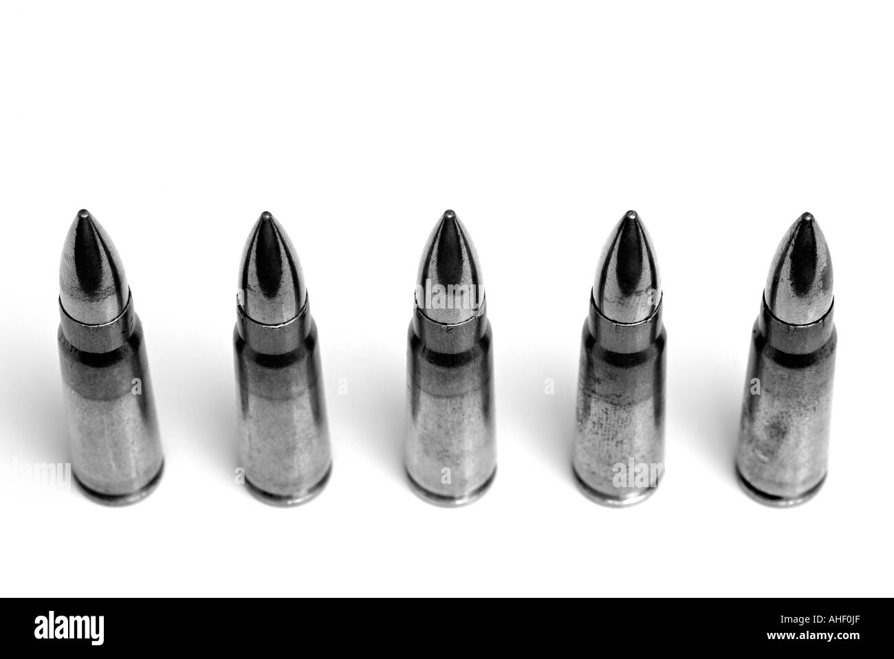 Bullets Lined Up Against A White Background Stock Photo - Alamy