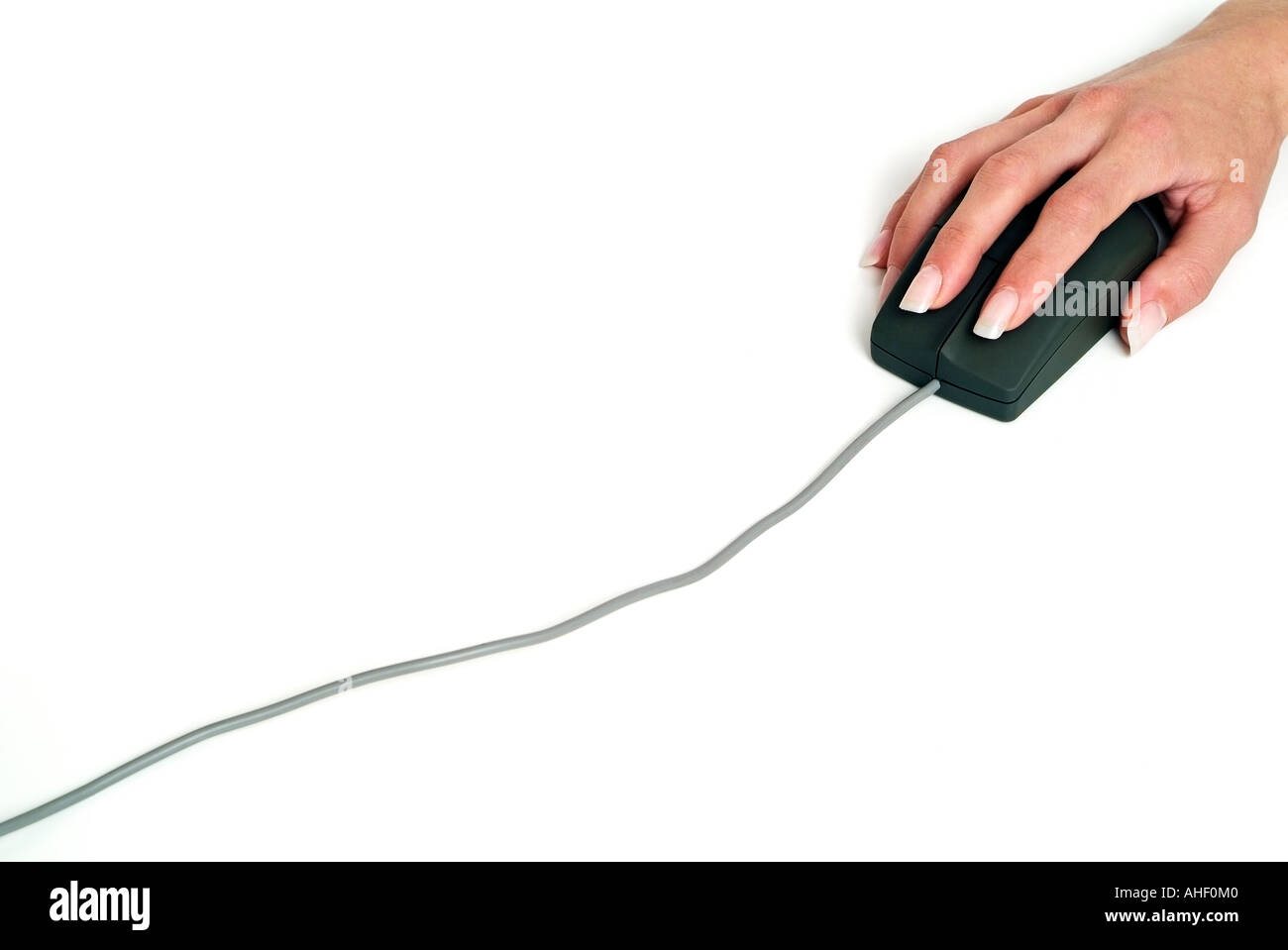 Womans Hand Operating a Computer Mouse Against a White Background Stock ...
