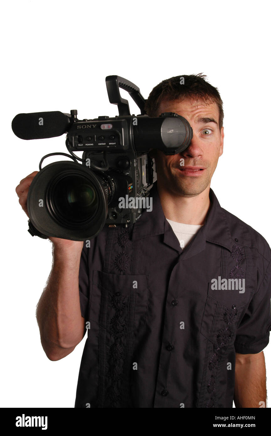 camera man with video camera Stock Photo - Alamy