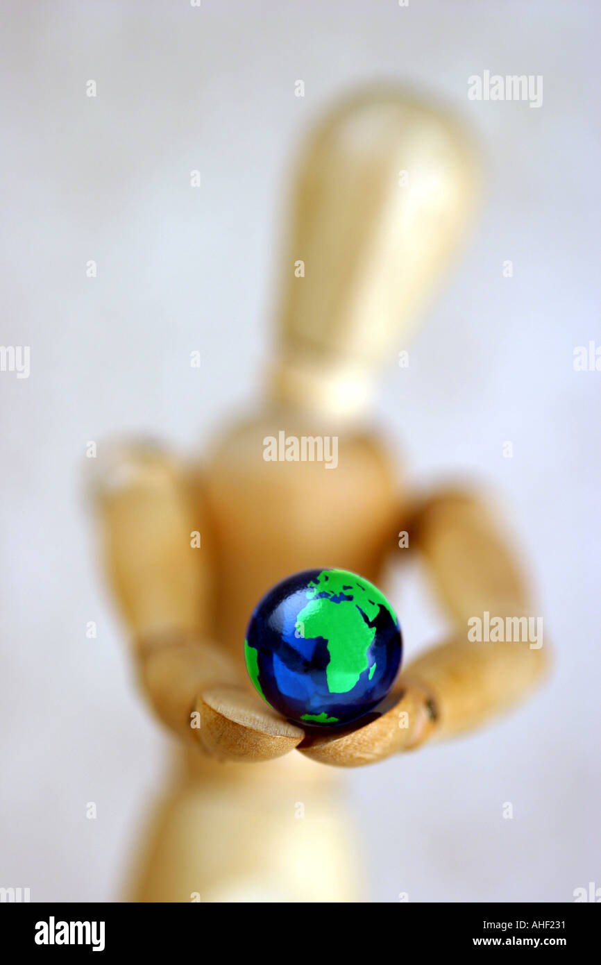 Business man holding atlas globe hi-res stock photography and images ...