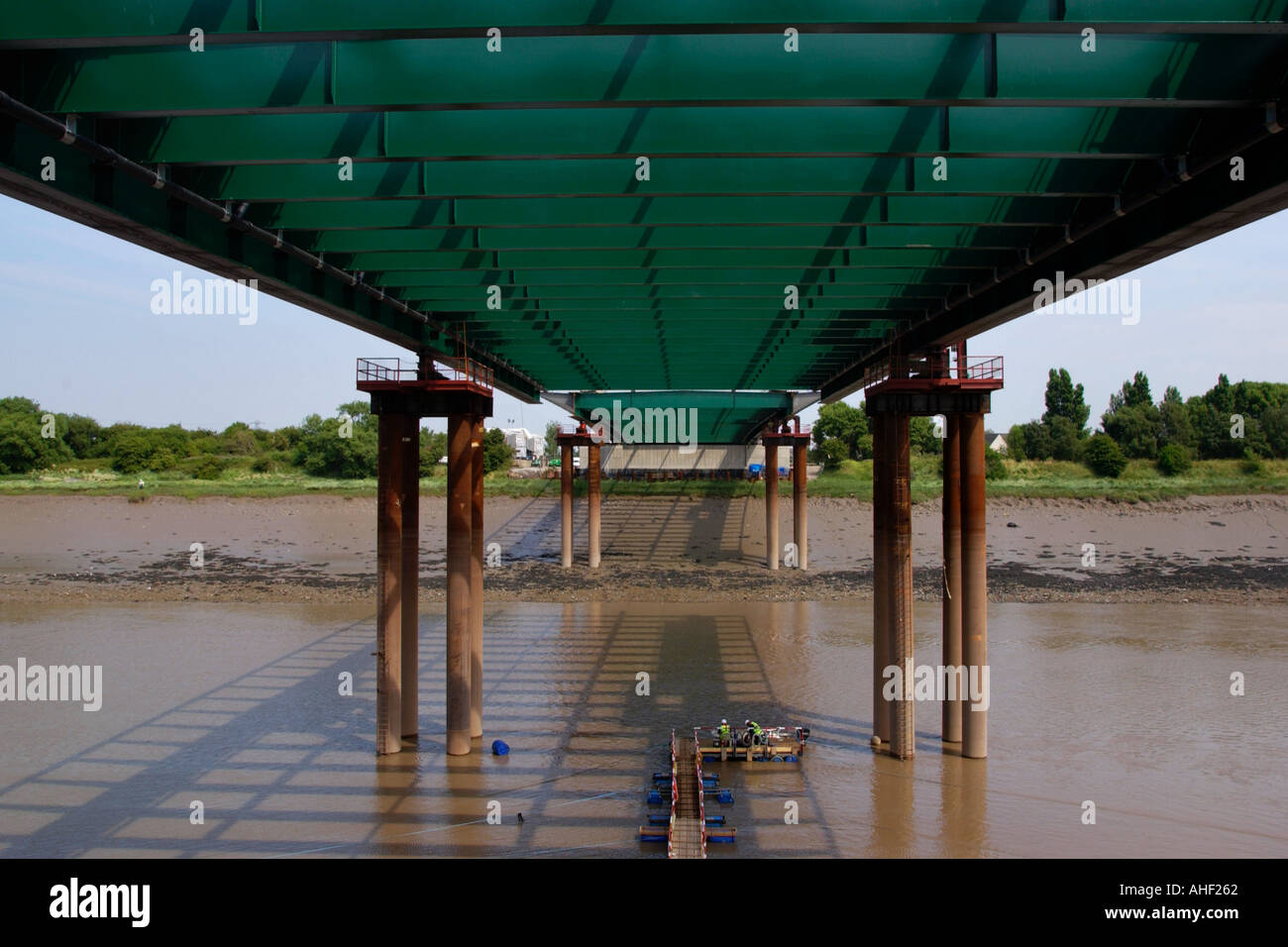 Road bridge under construction over the River Usk being winched into ...