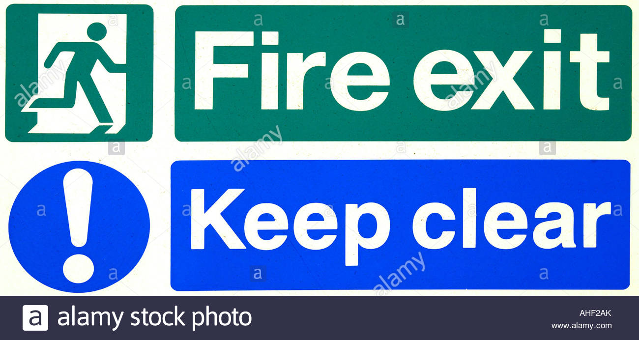 Fire exit, keep clear signpost Stock Photo - Alamy