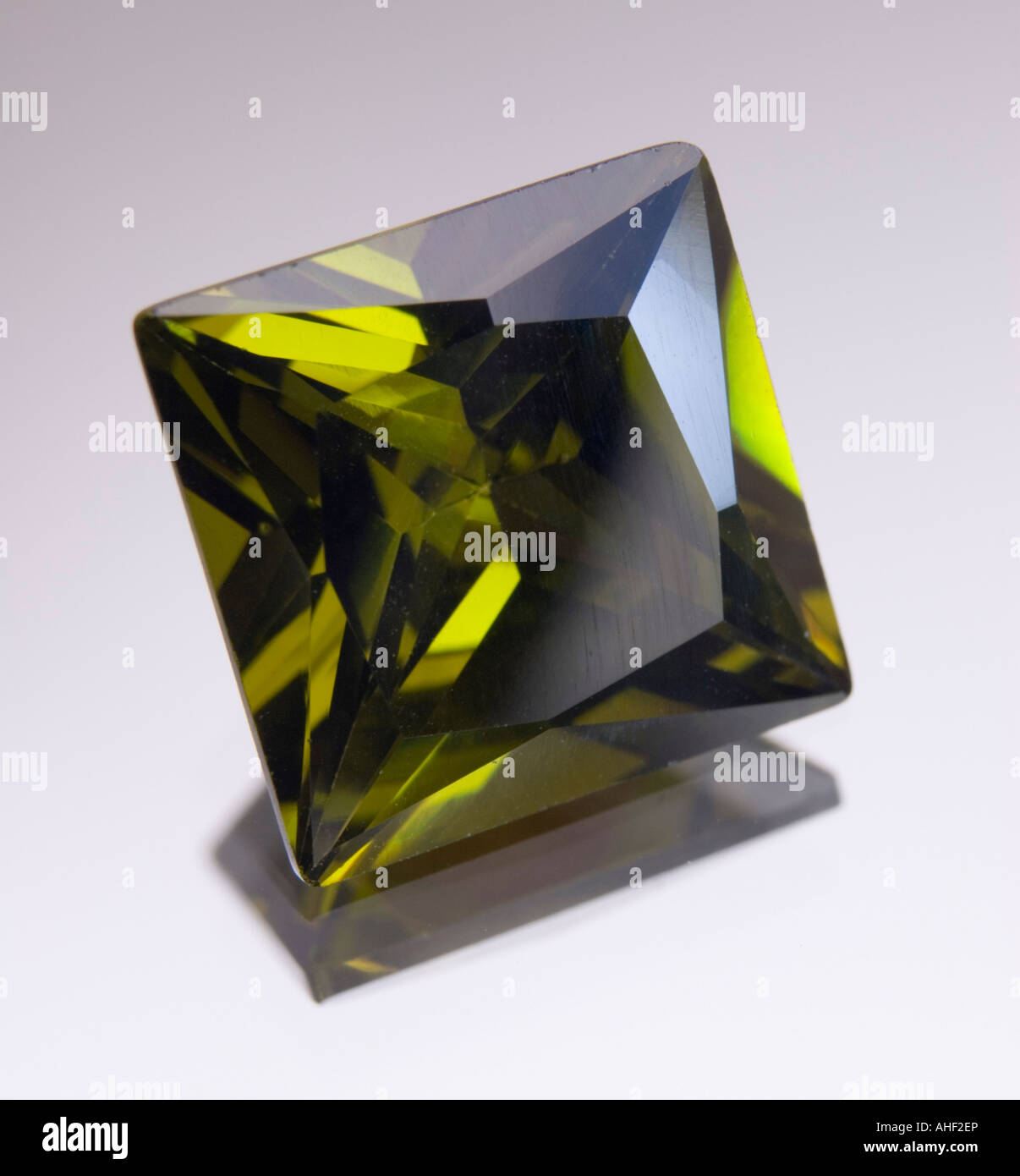 Princess-cut Peridot gemstone Stock Photo - Alamy